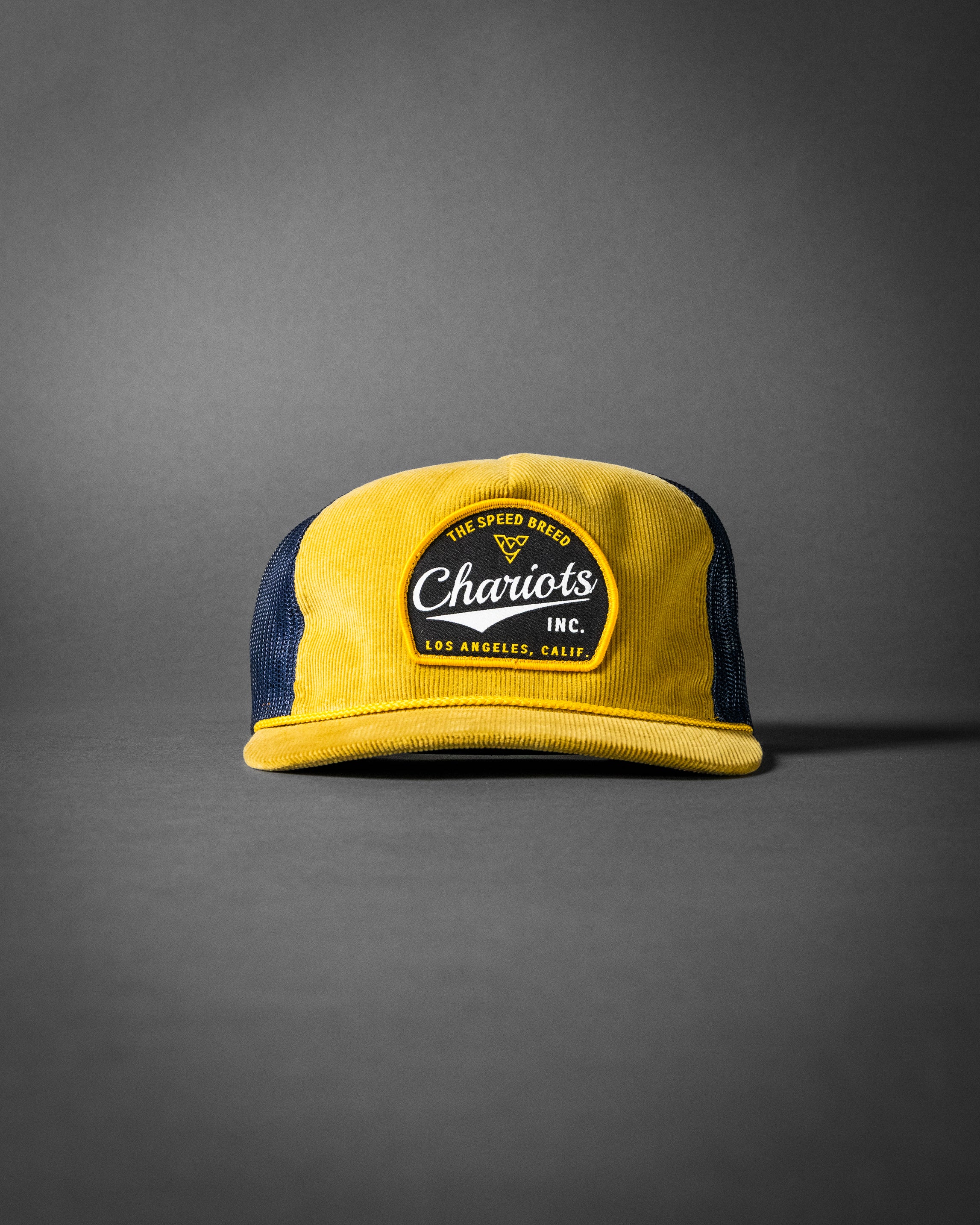 YELLOWJACKET (Amber Gold/Navy Corduroy Trucker Hat)