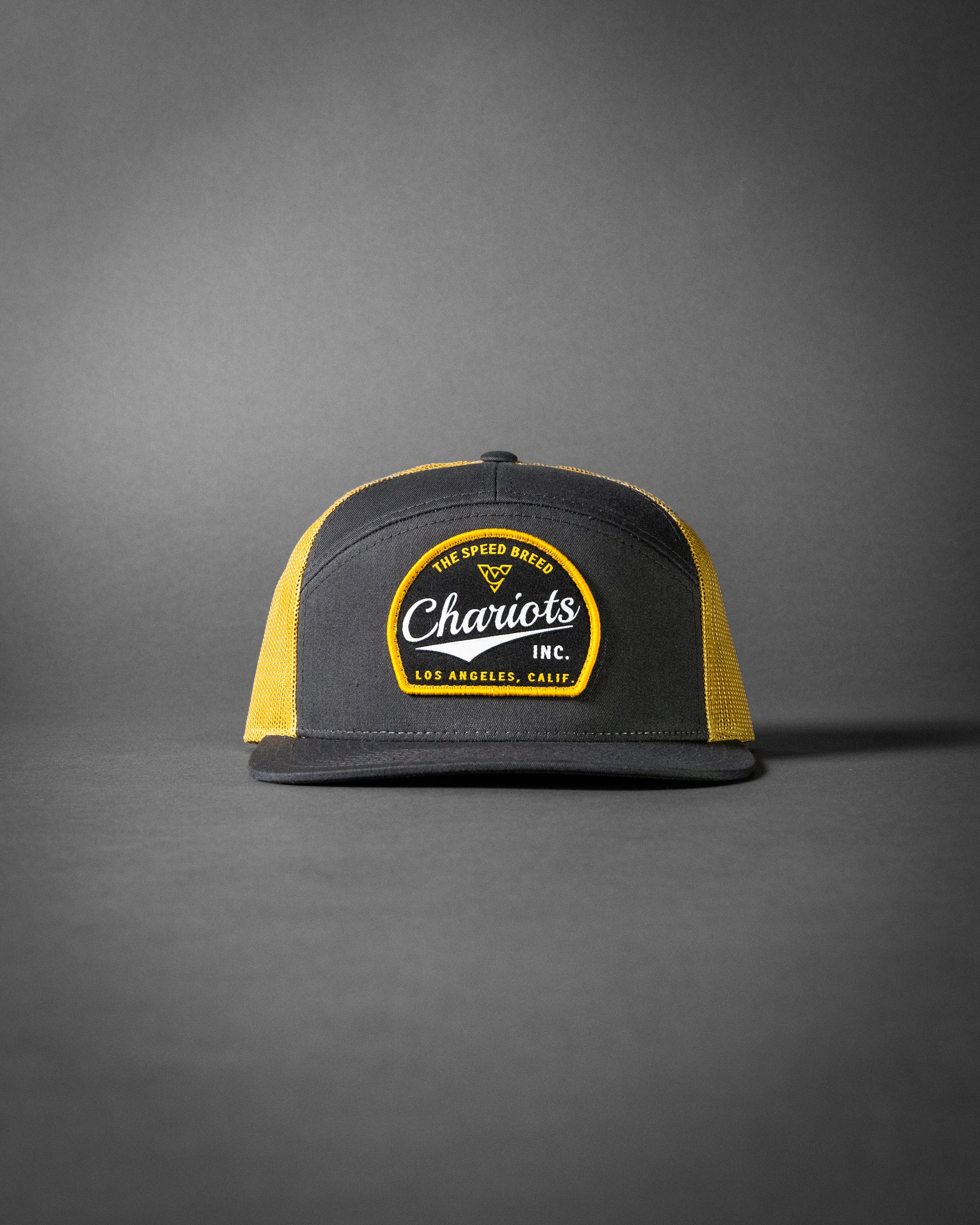 YELLOWJACKET (Charcoal/Old Gold Premium 7-Panel Trucker Hat)